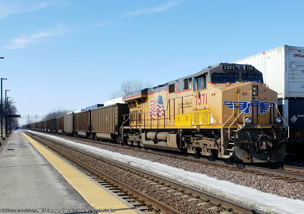 UP 7371 is taking a loaded coal train in to Chicago